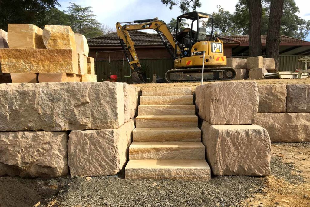 Sandstone Log Retaining Walls | The Landscaped Garden