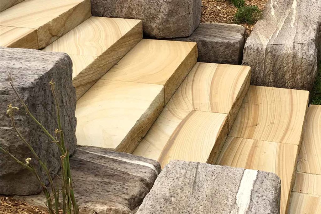 Sandstone Log Retaining Walls | The Landscaped Garden